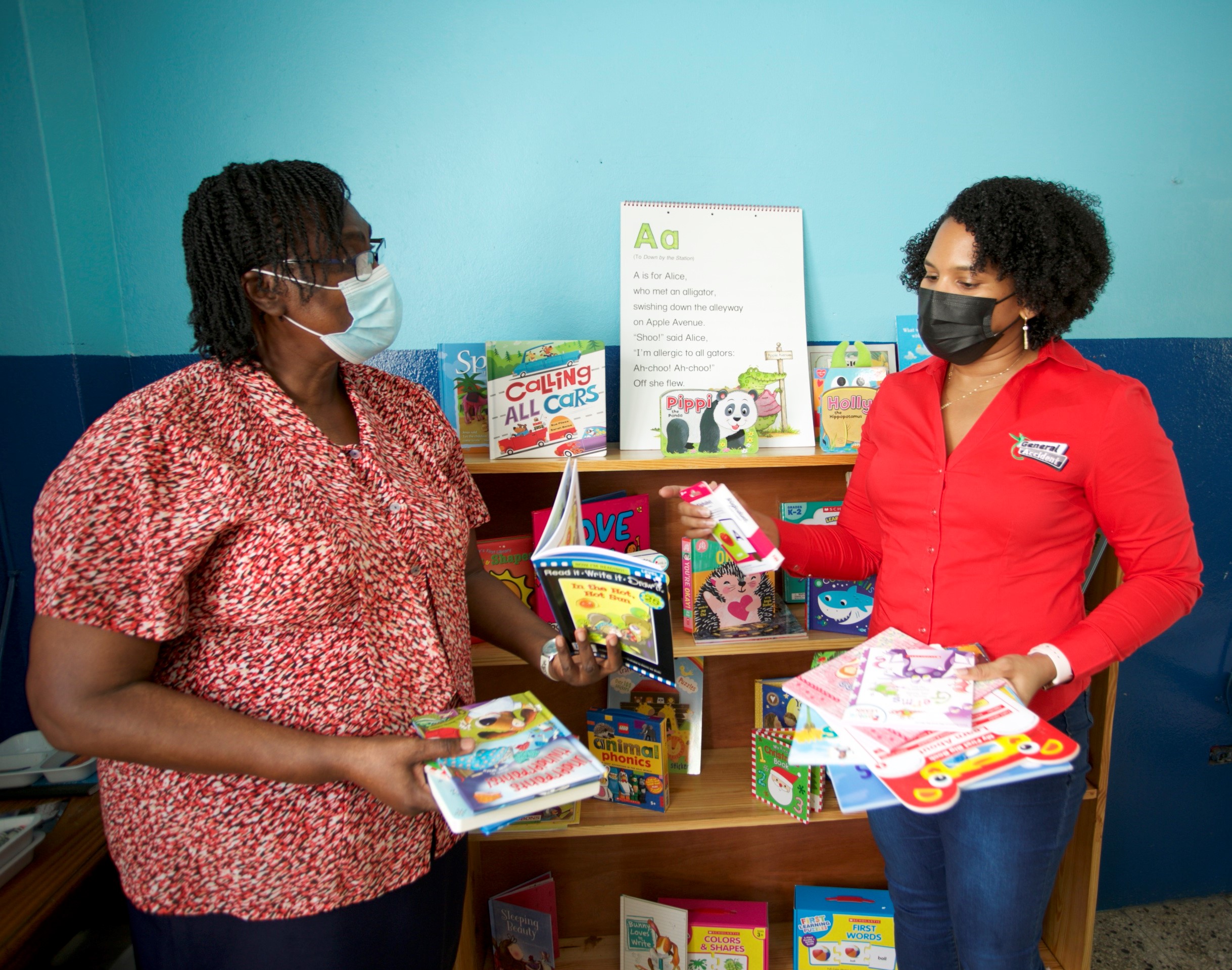 GenAc gifts books and shelves to Grants Pen ECI - General Accident